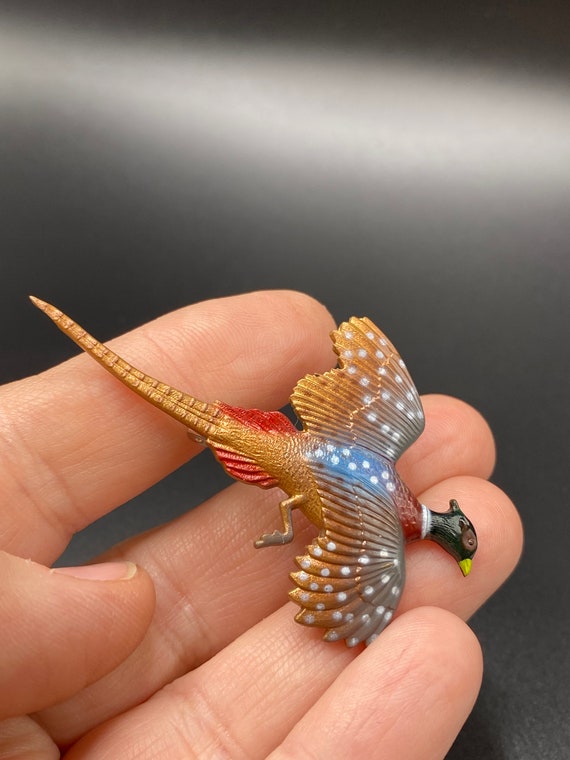 celluloid hand pin - Gem