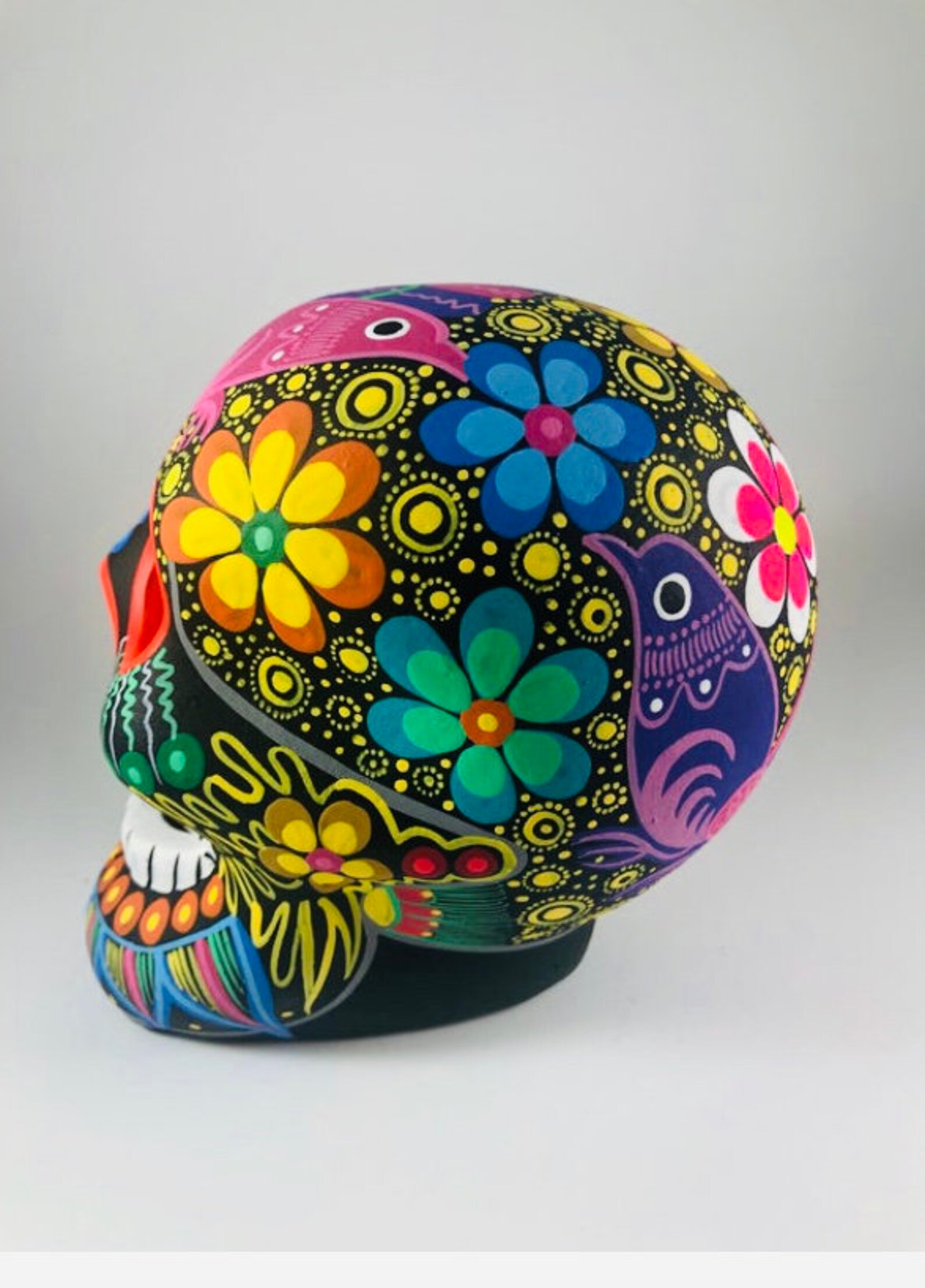 Large hand painted skulls, some colors brighten under black light ...