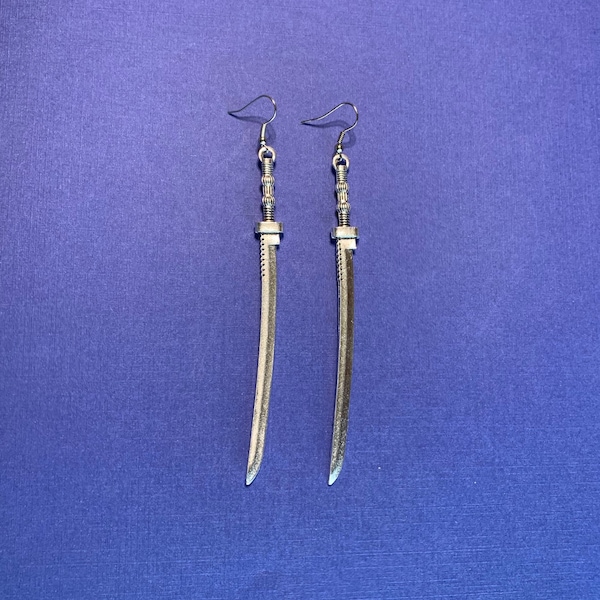 Weapon Earrings - Etsy