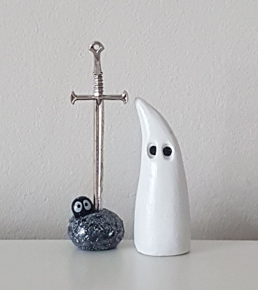 Art-boo-boo and Sword in the Stone - Whimsical Cute Minimalistic Ghost ...