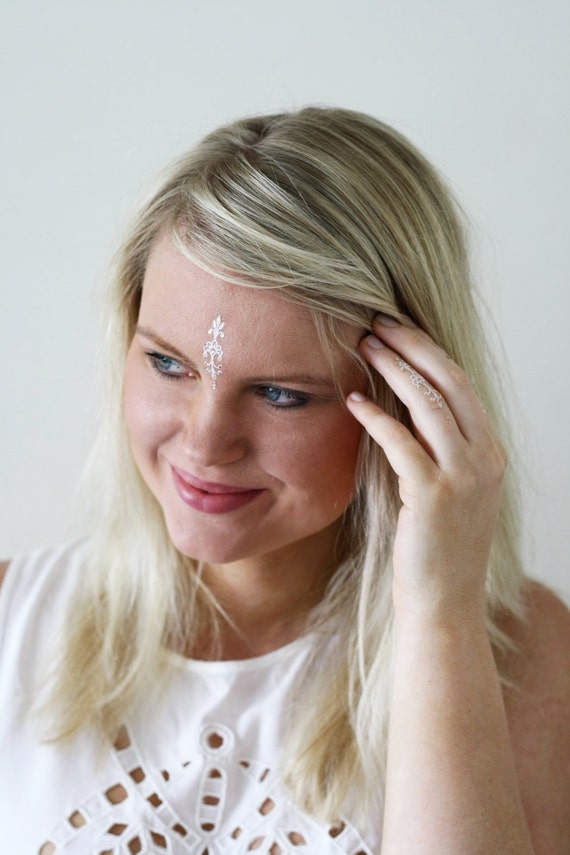 Forehead tattoo | Orangetattooshop.com