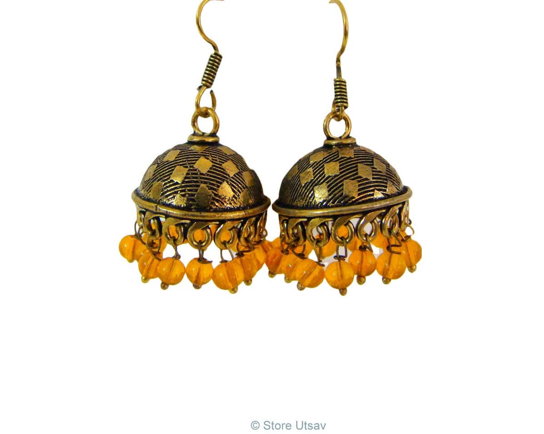 Yellow Engraved Copper Jhumka Oxidized With Yellow Handblown Glass ...