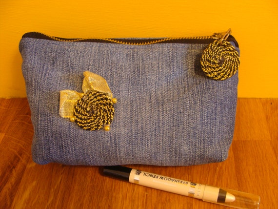 Items similar to Denim Makeup Bag with Gold Details on Etsy