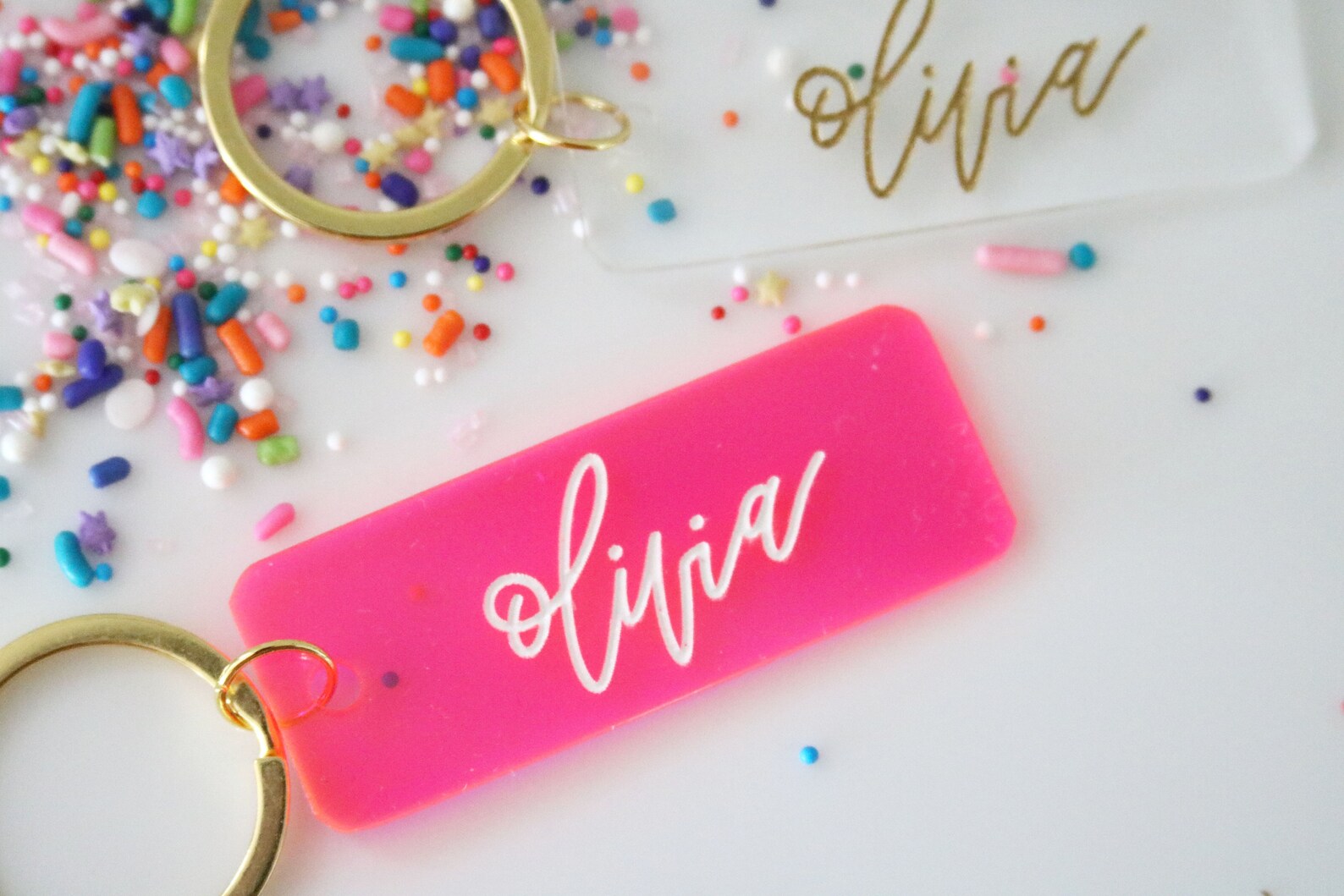 Custom calligraphy name keychain clear or fluorescent pink | Etsy