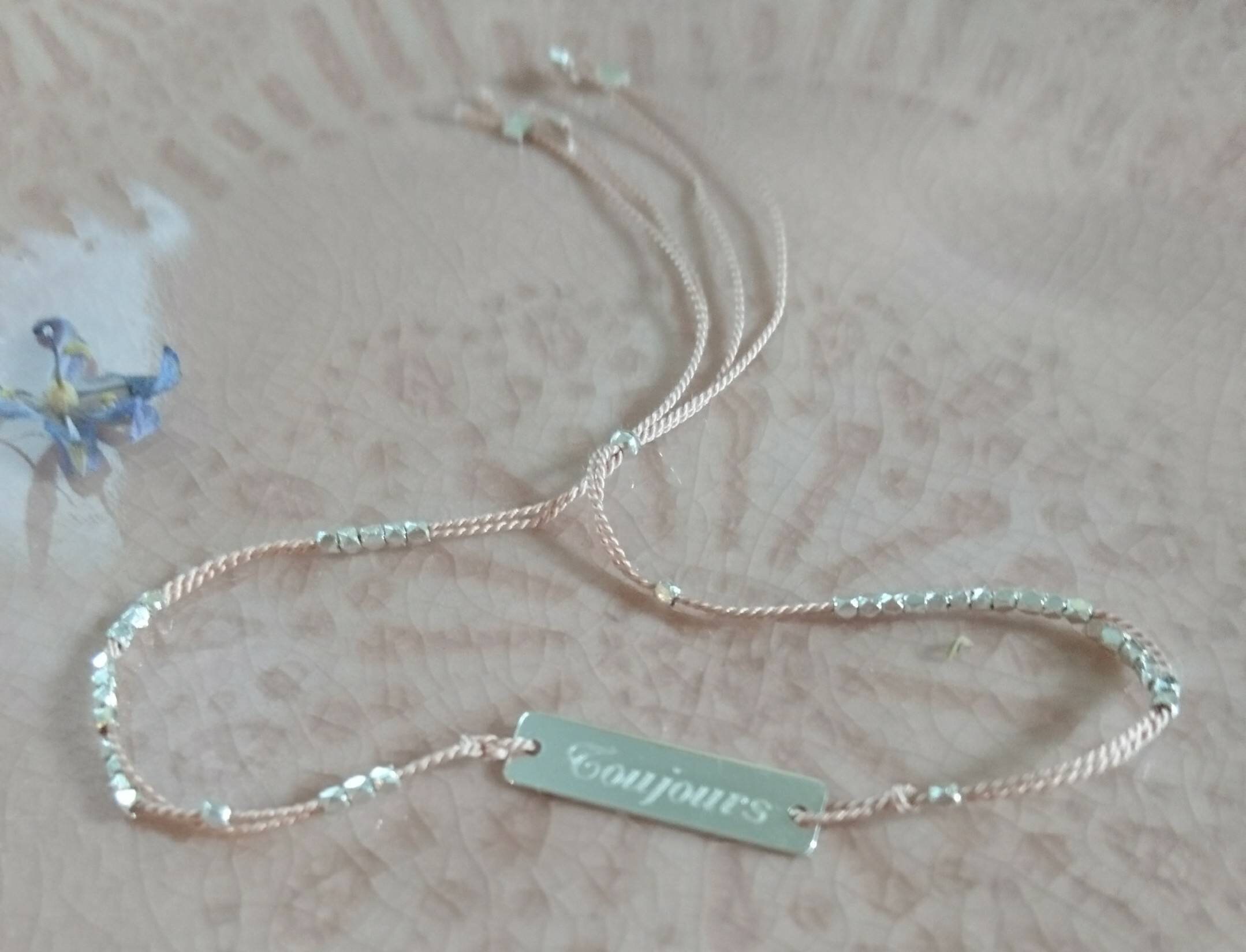 Toujours bar tag bracelet in sterling silver on silk cord,