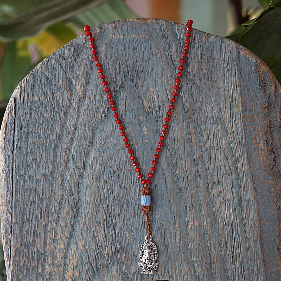 Charming Bohemian-inspired Necklace Features Crystal Beads and a Metal ...