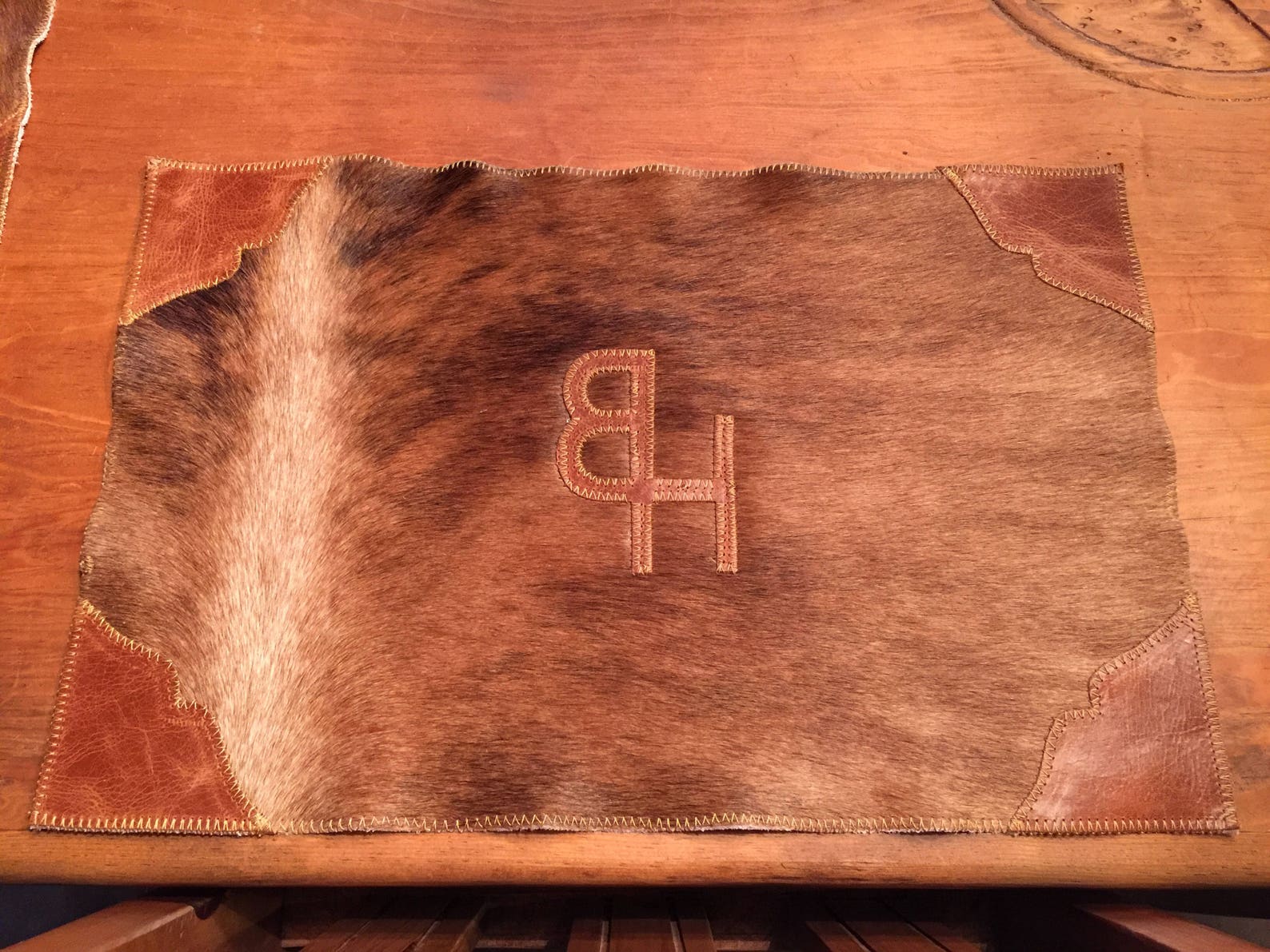 Custom Made Cowhide and Leather Place Mats | Etsy
