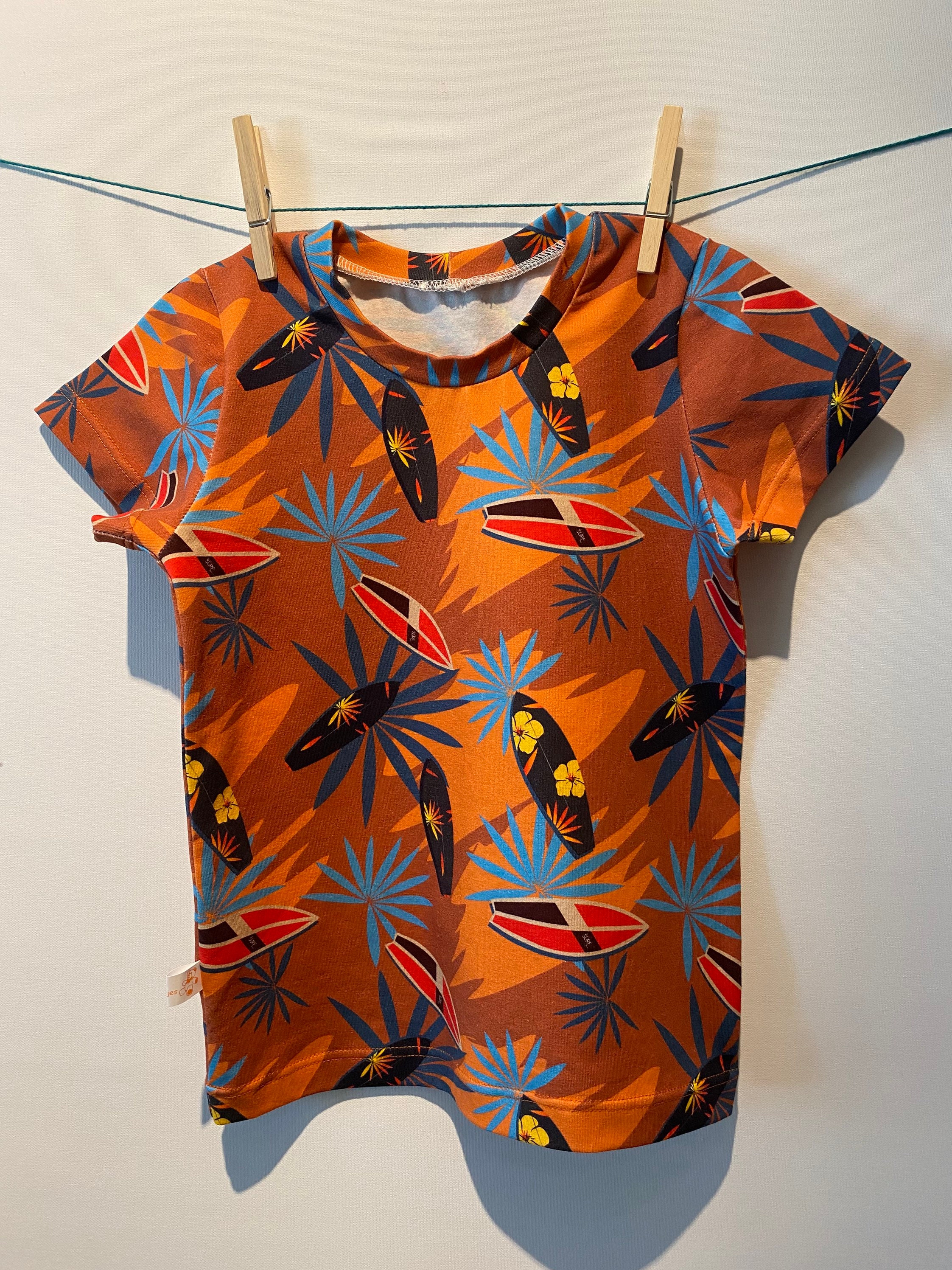 Rust/orange colored t shirt with tropical pattern short | Etsy