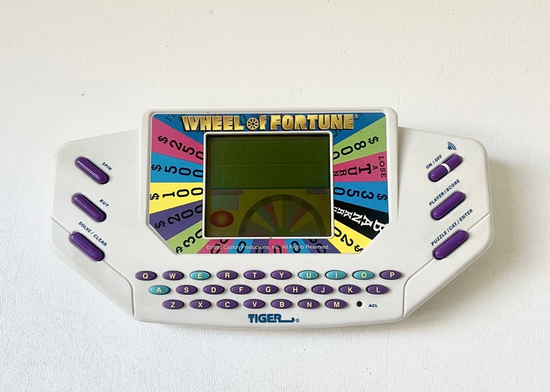 Vintage 1995 Hand Held Wheel of Fortune Game - Etsy