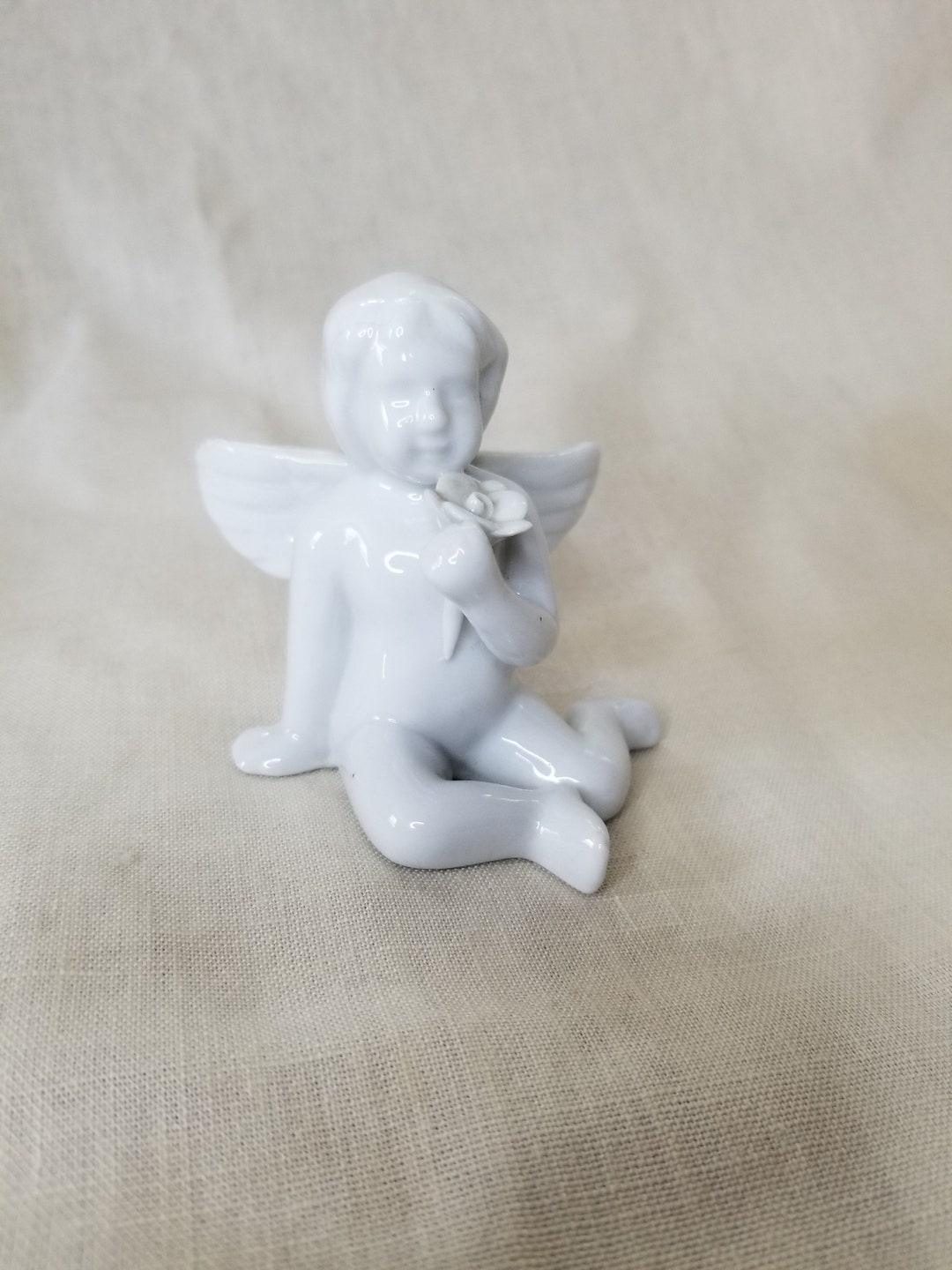 Small Seated Cherub Ceramic Figurine - Etsy
