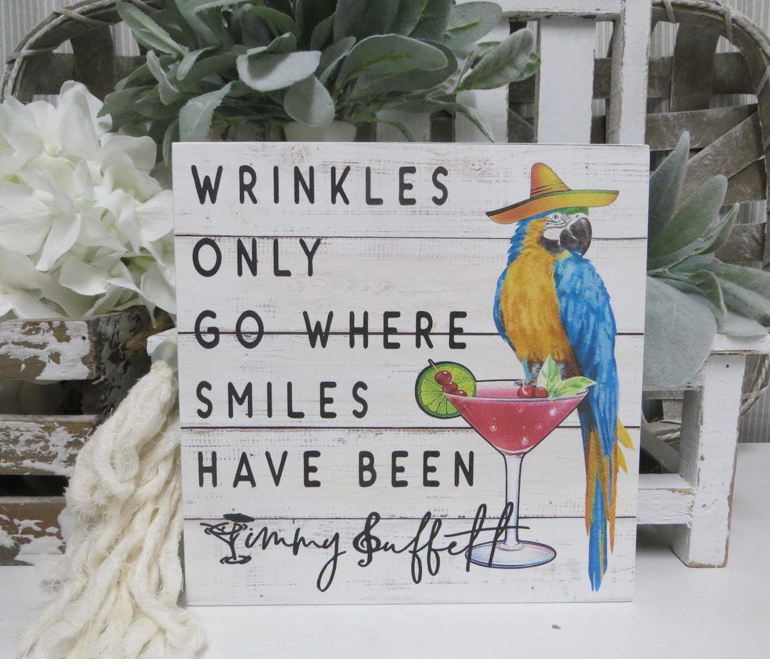 Beach Parrot Sign: Wrinkles Only Go Where Smiles Have Been - Jimmy ...