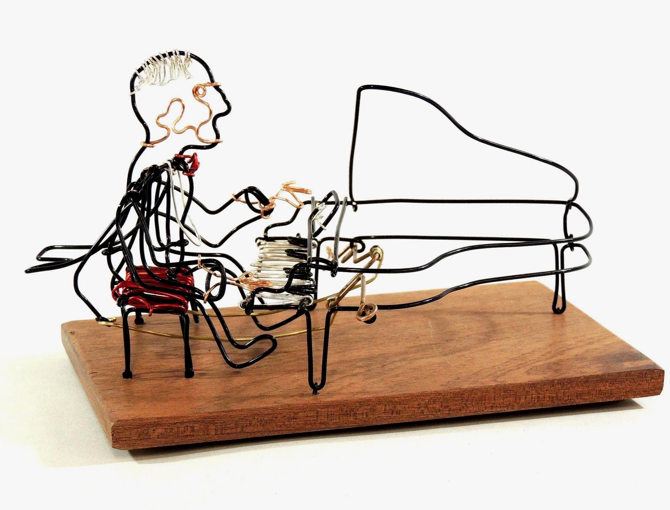 Piano Player, Whimsical Kinetic Pianist Plays the Piano When Handle is ...