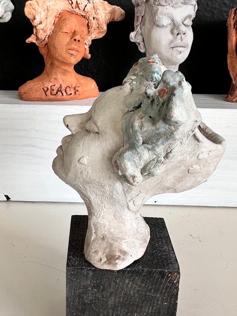 Ceramic Heads Chandelier - Etsy