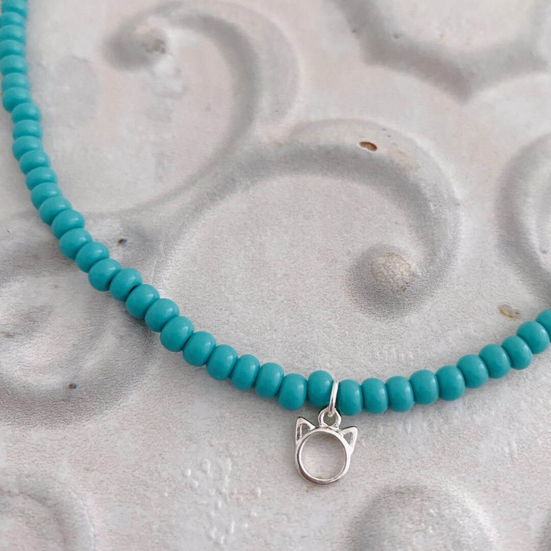 Tiny Sterling Silver Cat Outline Charm on Beaded Turquoise Czech Glass ...