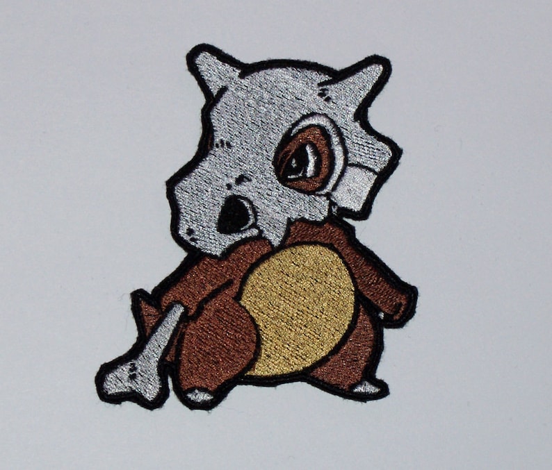 Cubone Iron on Patch Shiny Metallic Embroidered. Pokemon - Etsy