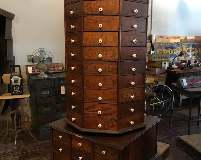 An Early ‘american Bolt & Screw Case Company’ Rotating Hardware Cabinet ...