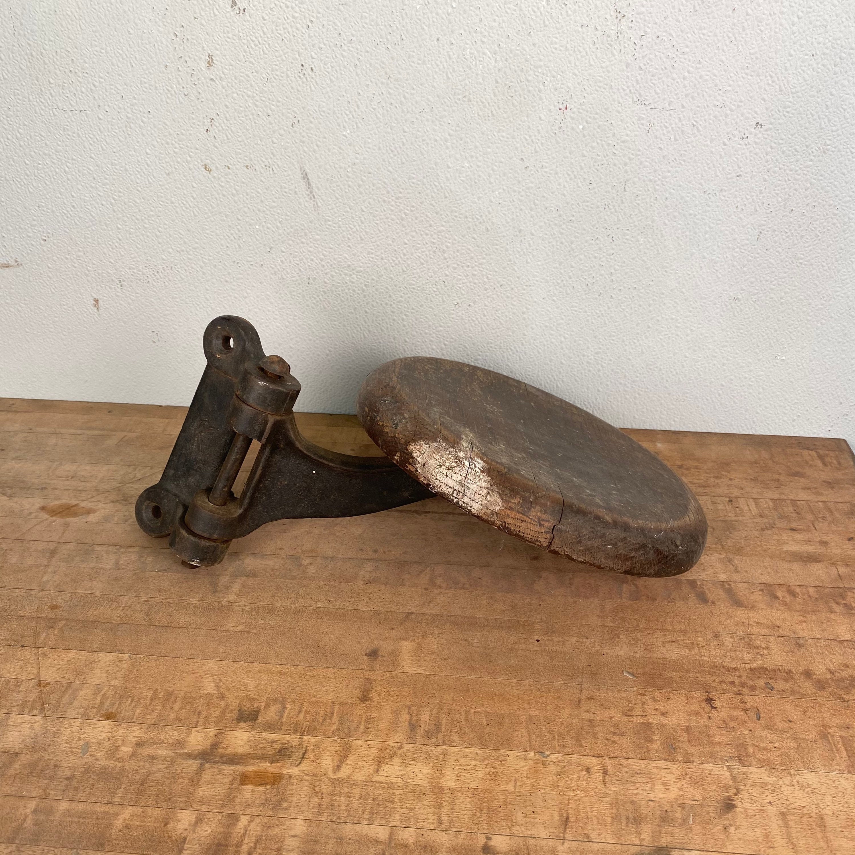 Original Vintage cast iron and oak swing stool | Etsy