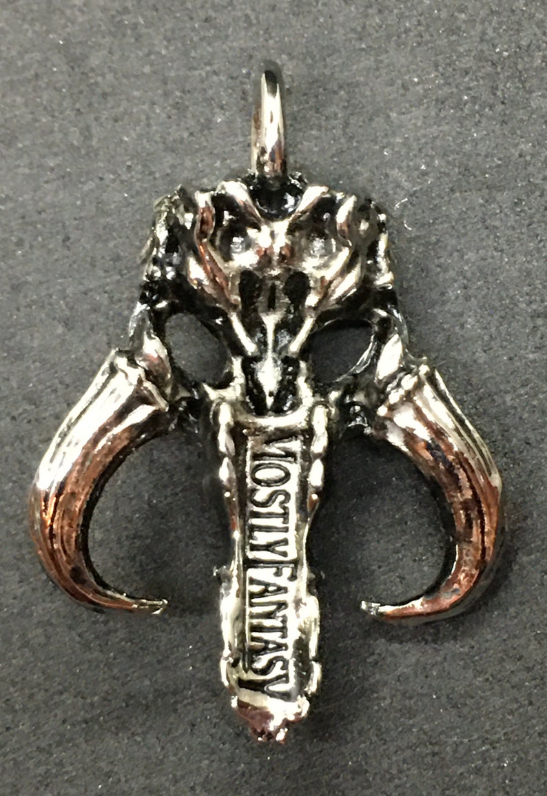 Mandalorian Mythosaur Skull Pendant polished/platedships to | Etsy
