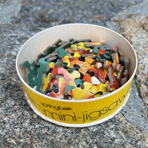 Springbok Mini Jigsaw Puzzle. in Defense of Candy. 7 Inch Round Puzzle ...