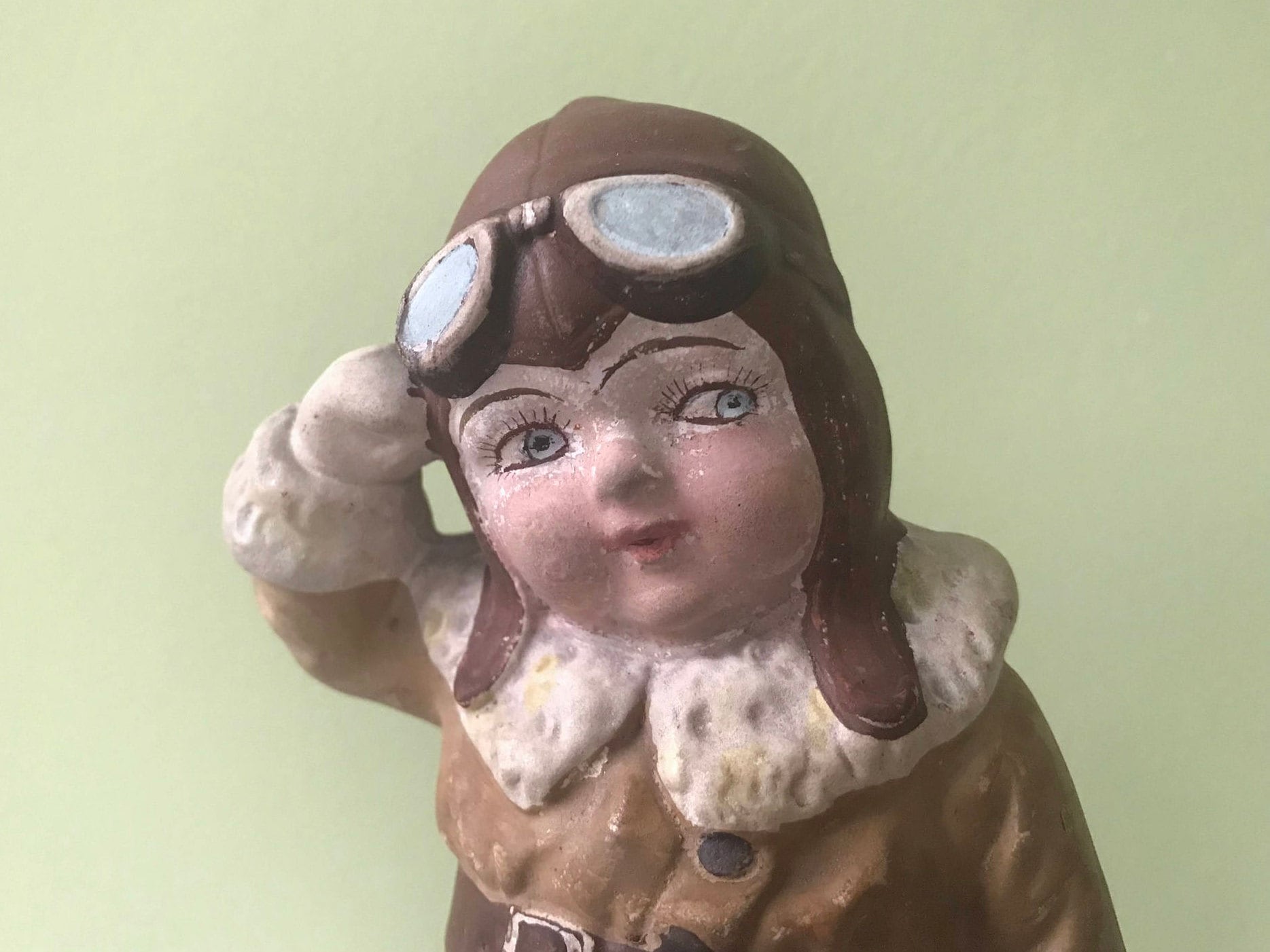 1930s Female Aviator Saluting in Sherpa Lined Flight Suit With Leather ...