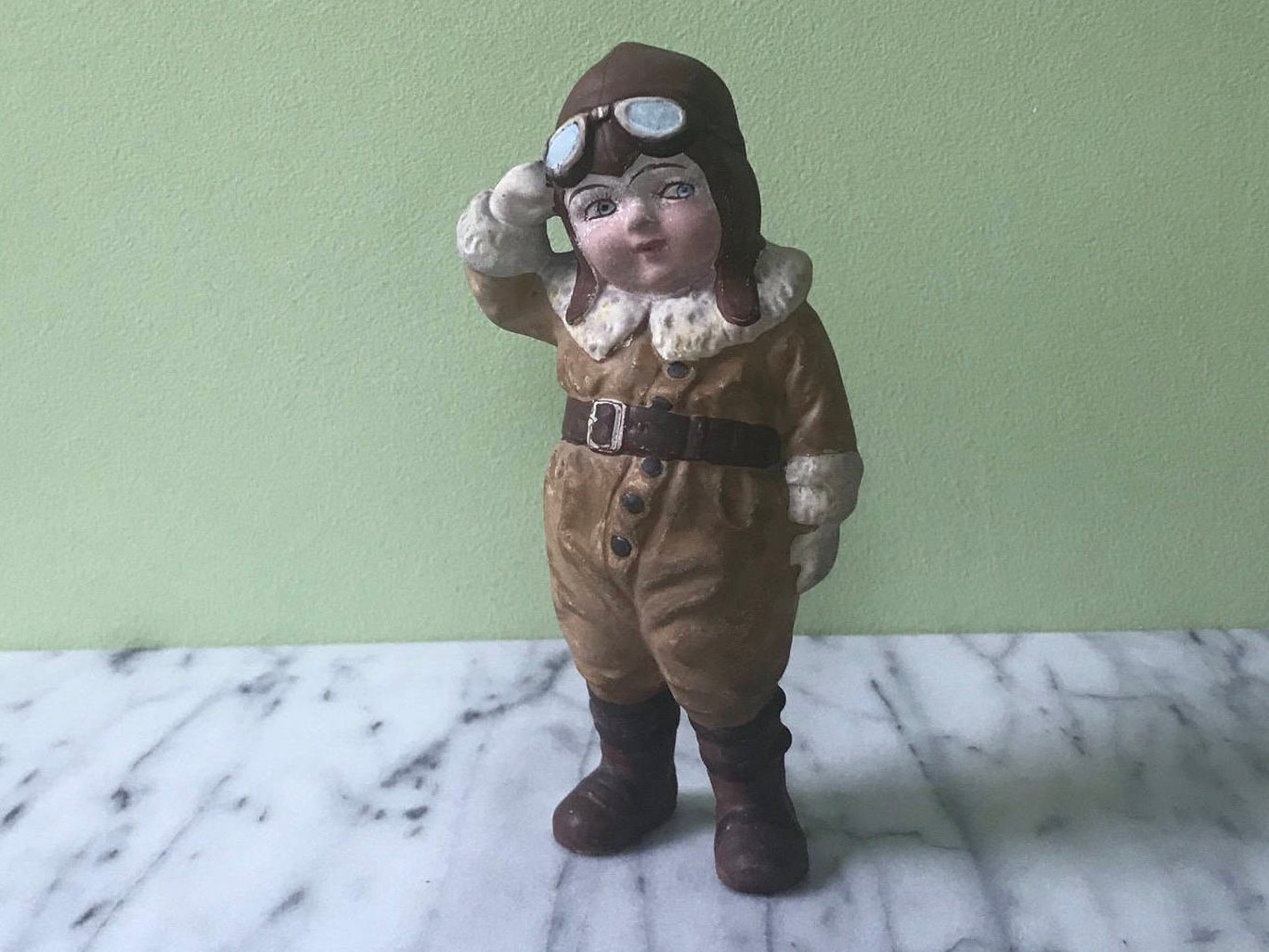 1930s Female Aviator Saluting in Sherpa Lined Flight Suit With Leather ...
