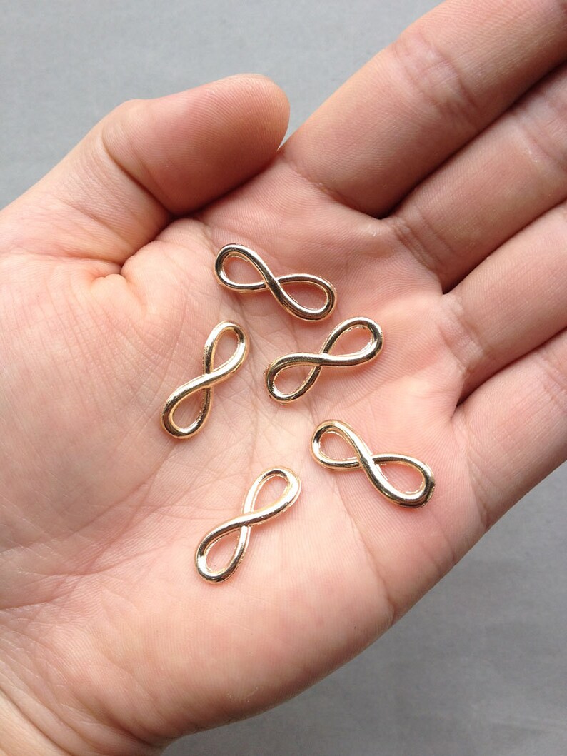 100 Pcs of Gold Figure 8 Connector Charms Infinite Charm 8x23mm - Etsy