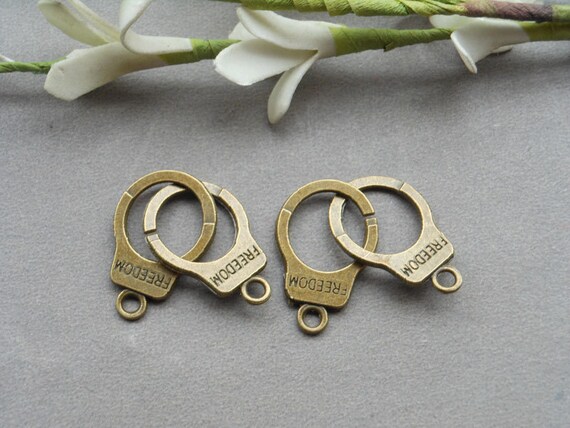 20 Pcs Ancient Bronze Handcuff Charms Manacle Charms 15x40mm | Etsy