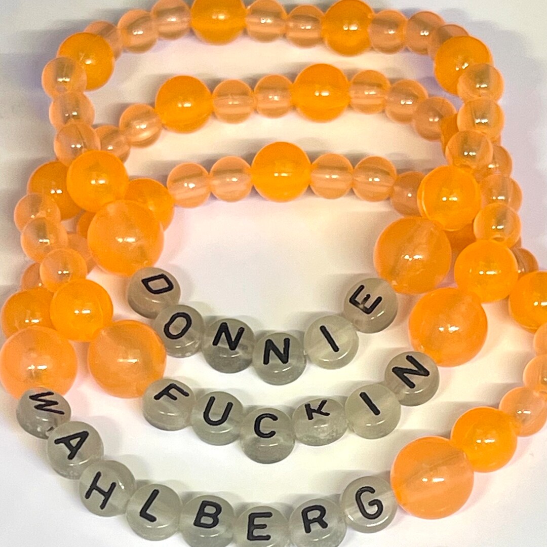 NKOTB DONNIE Fuckin WAHLBERG Magic Summer Tour Glow in the Dark Orange ...