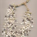 Pearl Cluster. 10 Strings of Pearls All Different Sizes Have Been Used ...