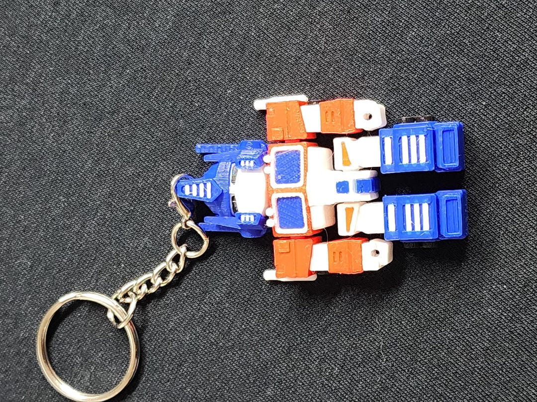 3D Printed Articulated Optimus Prime Keychain Transformer - Etsy