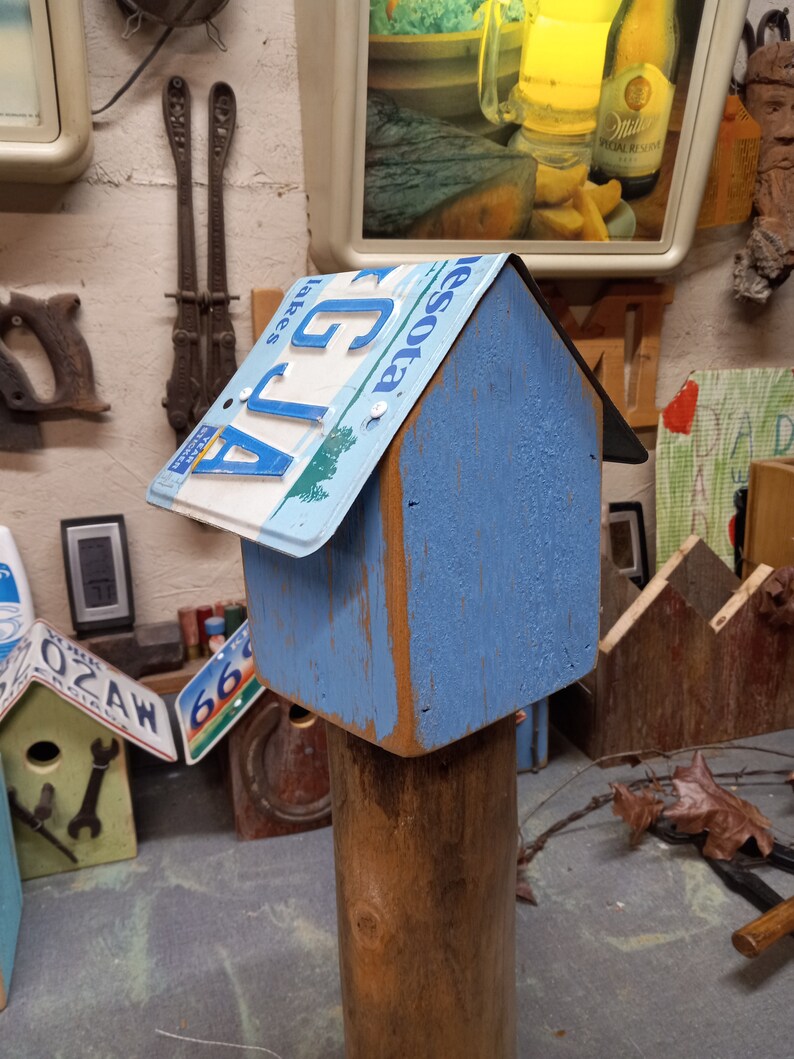 Minnesota License Plate Roof on Birdhouse With Snagged Bobber and ...