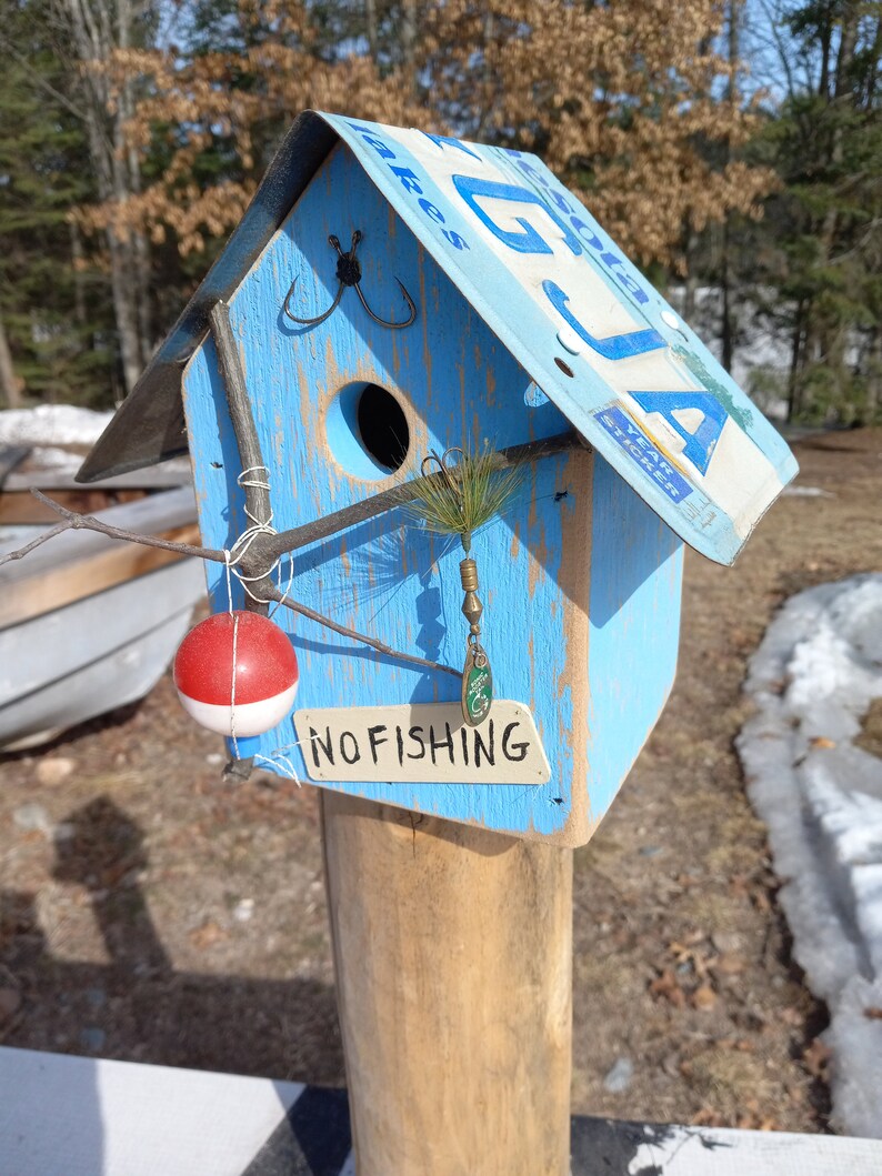 Minnesota License Plate Roof on Birdhouse With Snagged Bobber and ...
