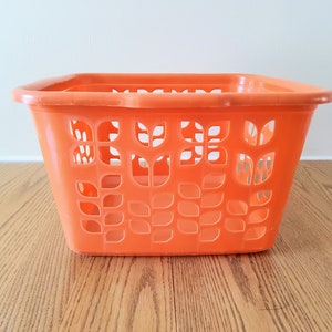 Orange laundry basket store