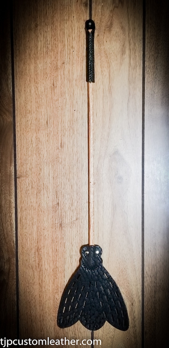 Novelty fly swatter store