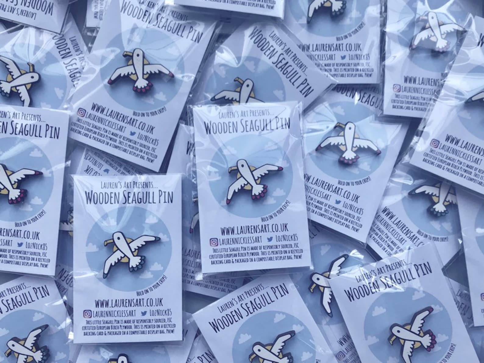 Wooden seagull pin badge with blue tips | Etsy