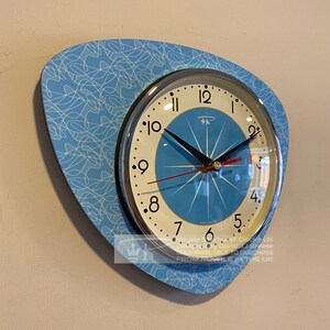 Handmade Asymmetric Queens Gambit Style Wall Clock in Ice Blue With ...