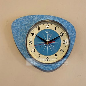 Handmade Asymmetric Queens Gambit Style Wall Clock in Ice Blue With ...