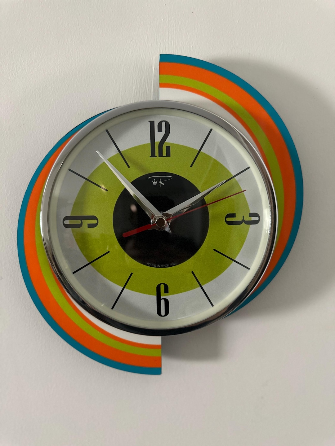 Top Selling Royalexe Kitchen Wall Clock by Royale - Spinning Meteor Eye ...