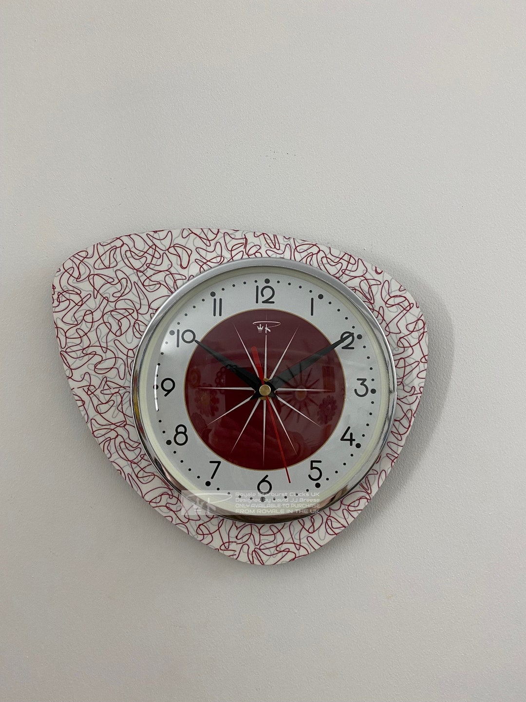 Royalexe Asymmetric Queens Gambit Style Wall Clock in Ice Blue With ...