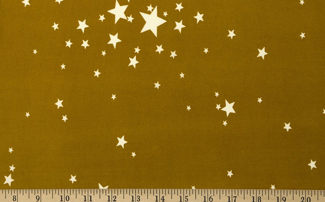 Double Brushed Poly Stars on Mustard Knit Fabric REMNANT, Knit Fabric ...