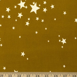 Double Brushed Poly Stars on Mustard Knit Fabric REMNANT, Knit Fabric ...