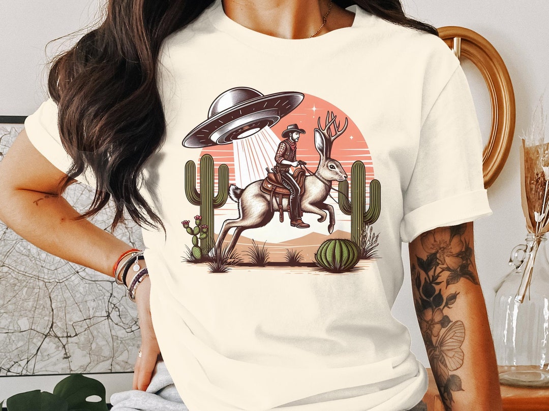 Unique Cowboy Riding Jackalope T-shirt, UFO Western Sunset Desert Theme ...