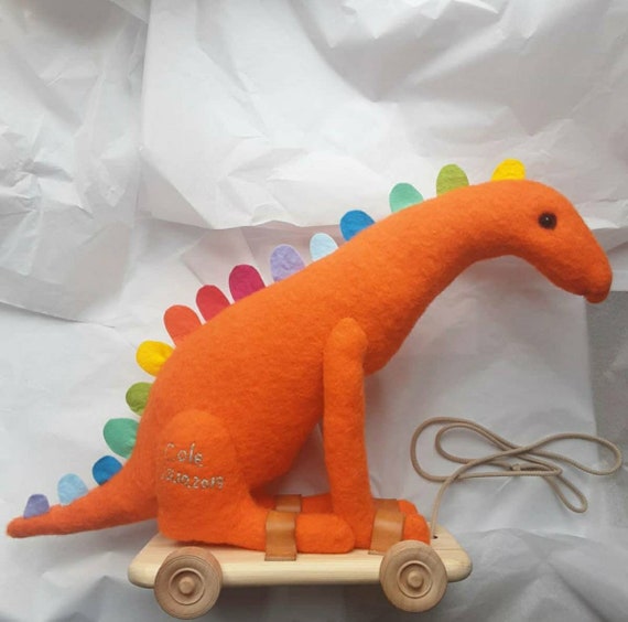 Pull along dinosaur toy | Etsy