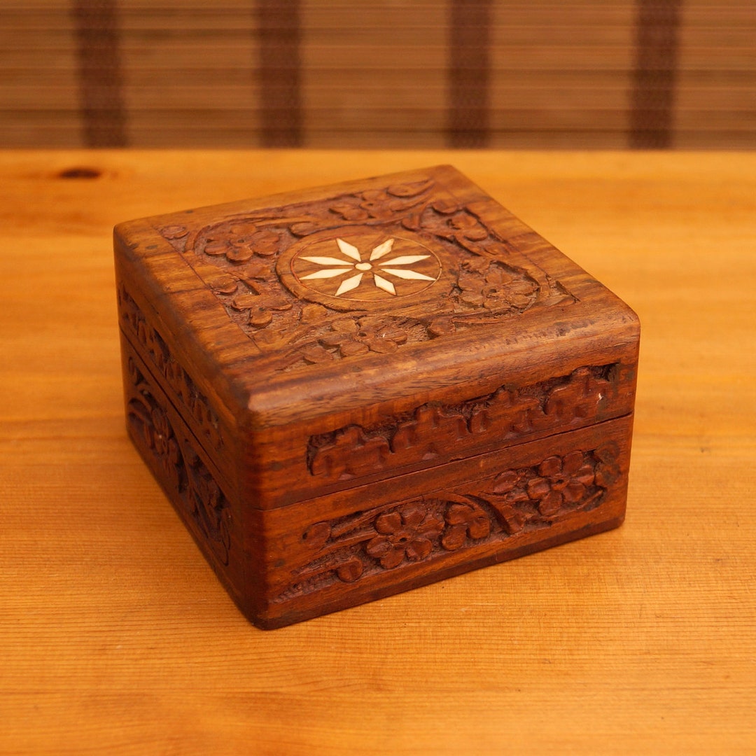 Jewellery Box With a Floral Design Around It and Soft, Puple Fabric ...