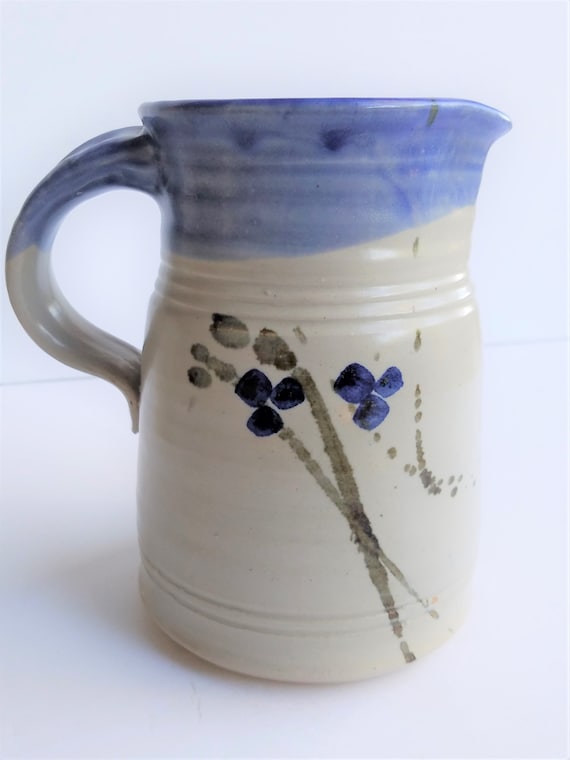 Pottery Pitcher With Blue Rim and Stylized Floral Artist | Etsy