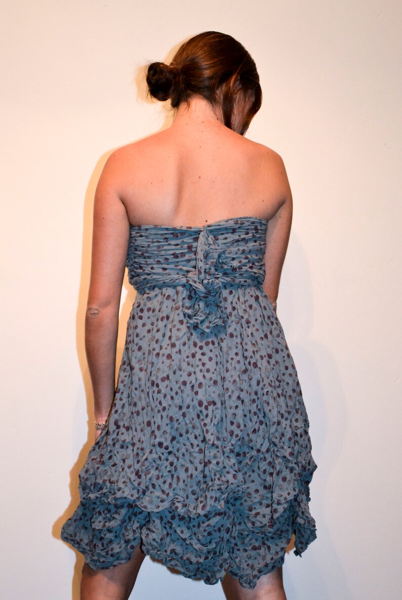 Dress Was Knee-length Strapless Top Ties to Drape Across the Chest and ...