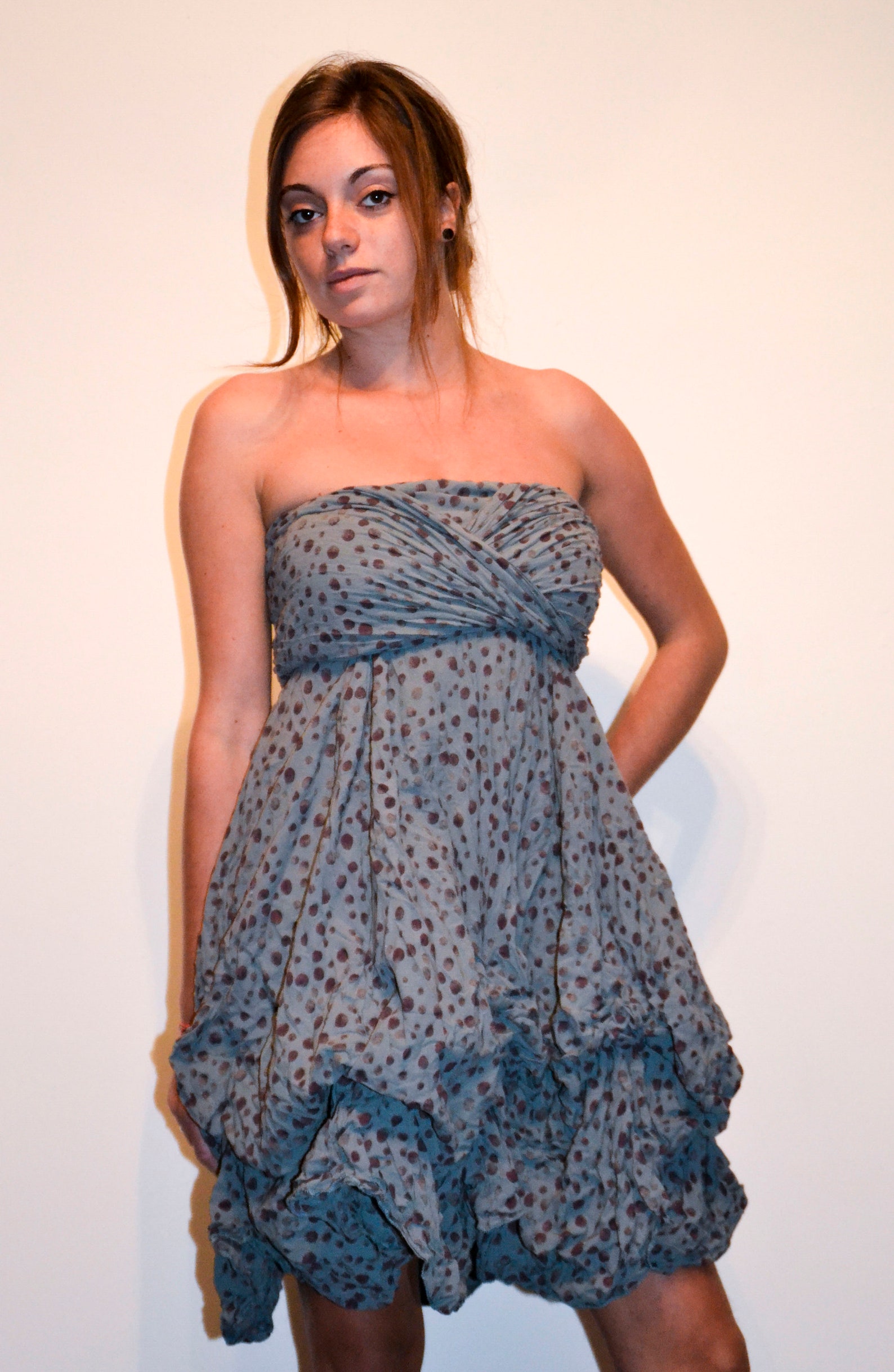 Dress Was Knee-length Strapless Top Ties to Drape Across the Chest and ...