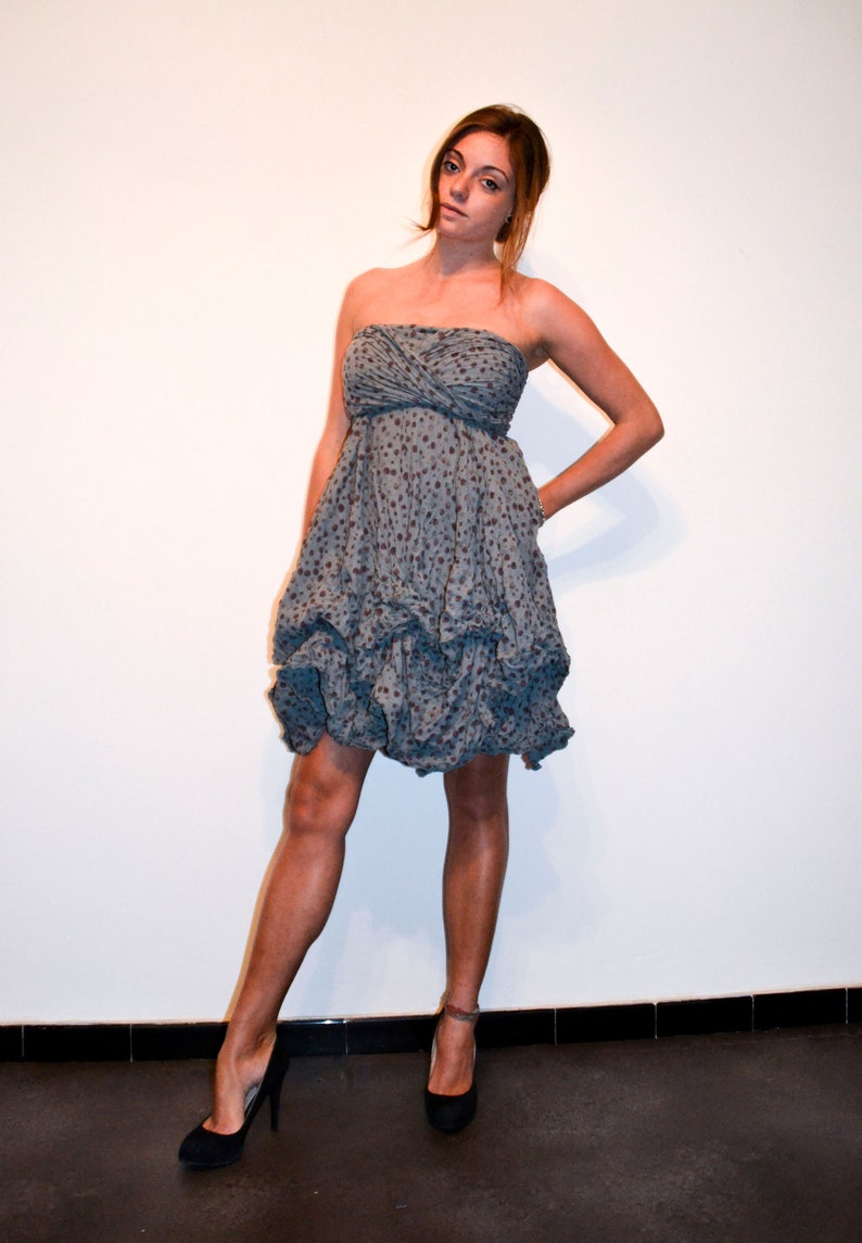 Dress Was Knee-length Strapless Top Ties to Drape Across the Chest and ...