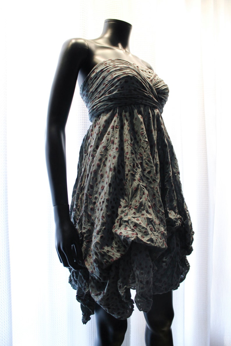 Dress Was Knee-length Strapless Top Ties to Drape Across the Chest and ...