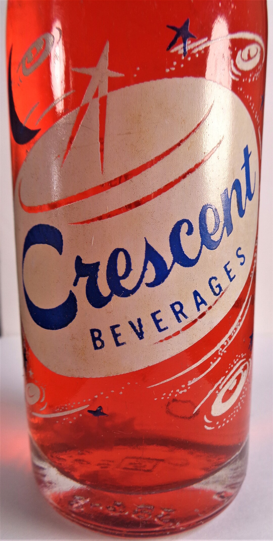 Crescent Beverages, Soda Pop Bottle With Contents and Cap. Flying ...